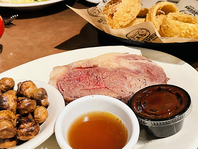 Behold, the crown jewel of beef! This prime rib is so perfectly cooked, it could make a vegetarian question their life choices.