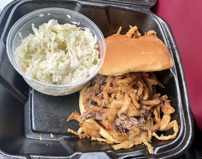 The pulled pork sandwich: Where tangy slaw meets smoky meat in a dance more perfect than Fred and Ginger.