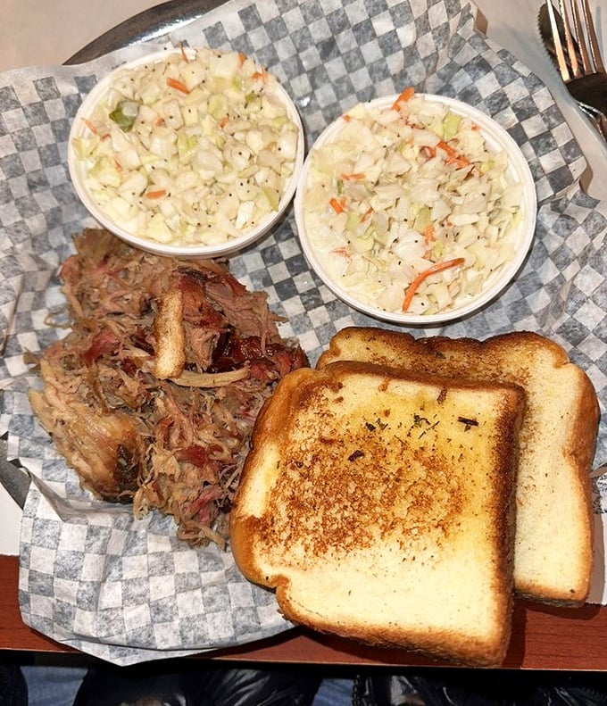 Pulled pork perfection! This plate is so inviting, you'll want to build a little log cabin out of those golden garlic toasts.