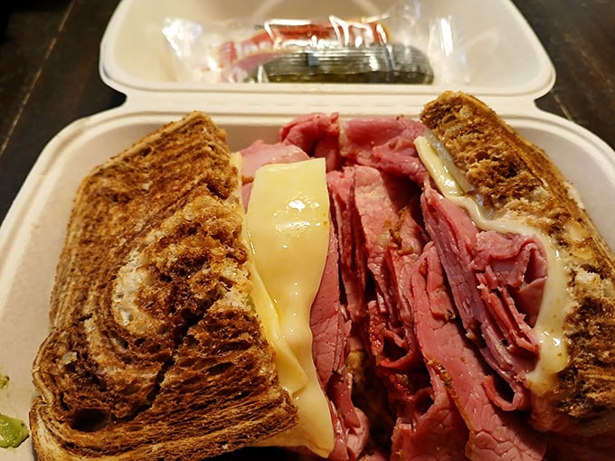 Behold, the Reuben in all its glory! Layers of corned beef, sauerkraut, and melty cheese create a sandwich that's more stacked than your grandma's photo albums.