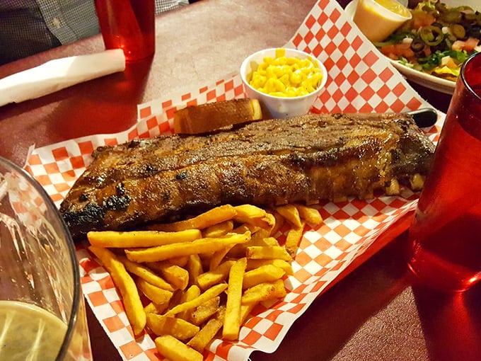 Behold, the carnivore's dream team: a rack of ribs that could make Fred Flintstone jealous, paired with golden fries that are anything but side players.
