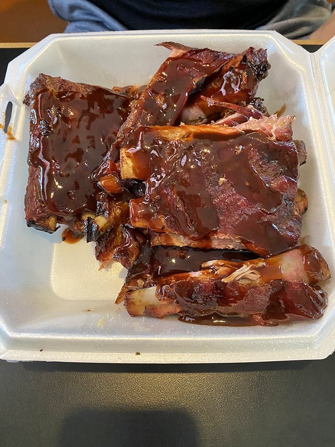 These ribs aren't just fall-off-the-bone tender; they're practically doing the cha-cha slide right onto your plate. Finger-licking good doesn't even begin to cover it.