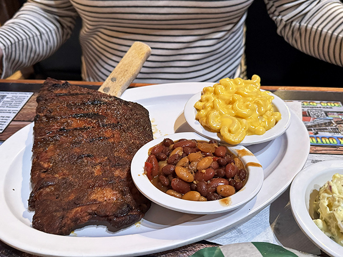 The BBQ trifecta: Ribs, mac and cheese, and baked beans. It's like the Avengers of comfort food assembled on one plate.