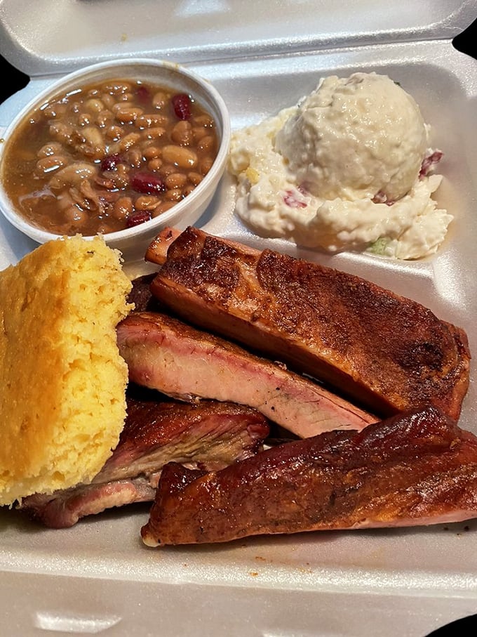 The BBQ Grand Slam! This platter is what food fantasies are made of &ndash; ribs, sides, and a cornbread so good, it should be illegal.