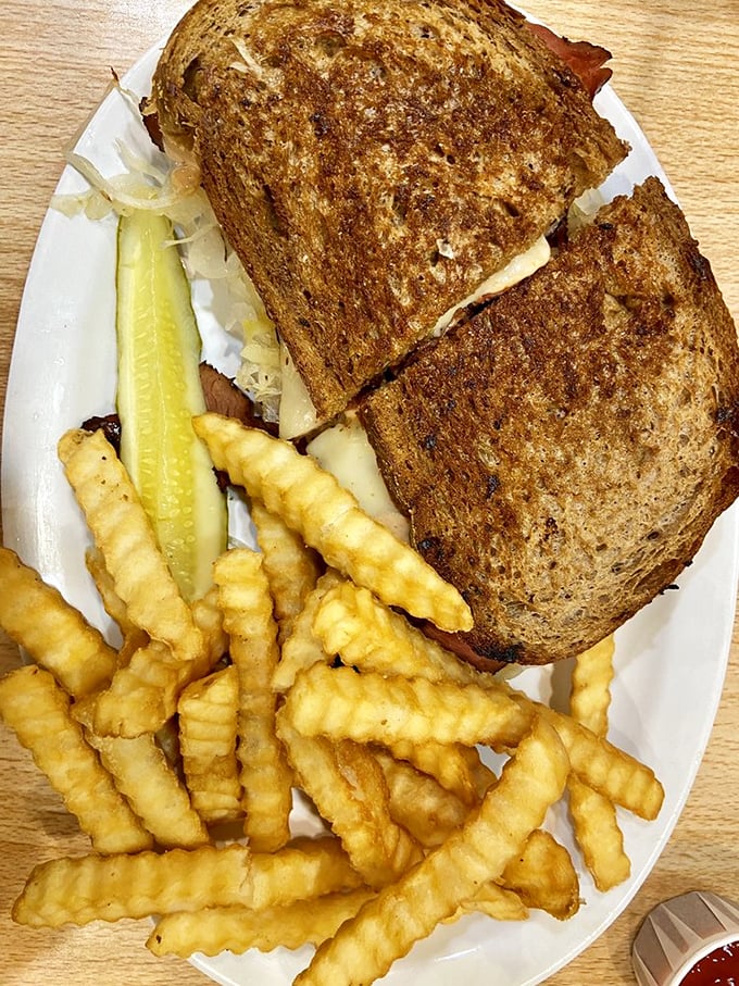 The Russian Reuben: where East meets Midwest in a crispy, cheesy symphony. Those fries? The perfect backup dancers.