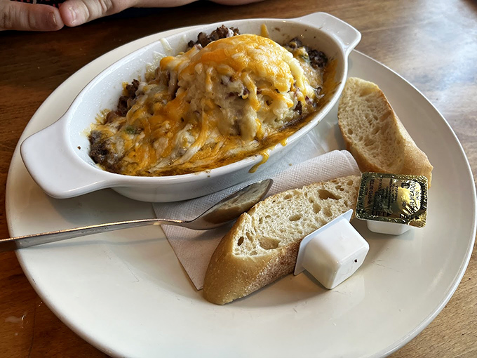 Shepherd's Pie that would make the old country proud, topped with perfectly melted cheese and served with bread for proper sauce-sopping.