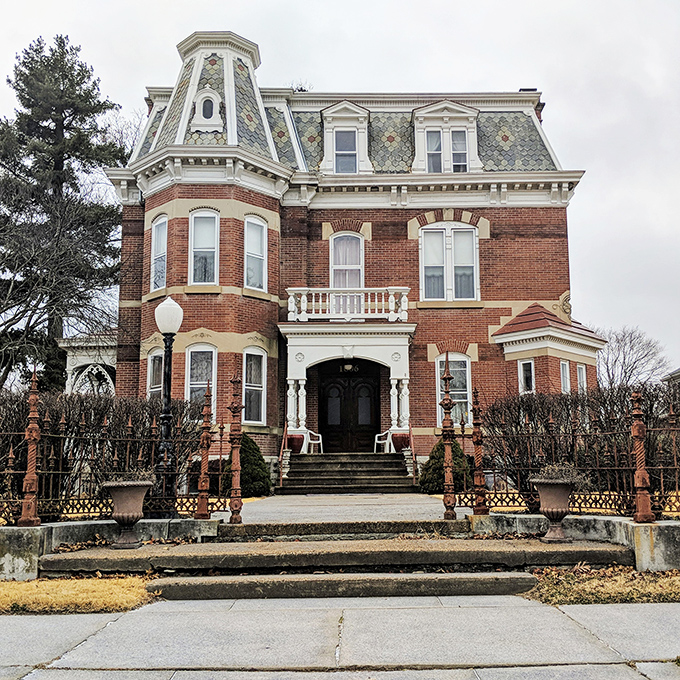 Stark Mansion rises like a Victorian dream, its ornate details and commanding presence suggesting its original owner wasn't familiar with the concept of "understated."