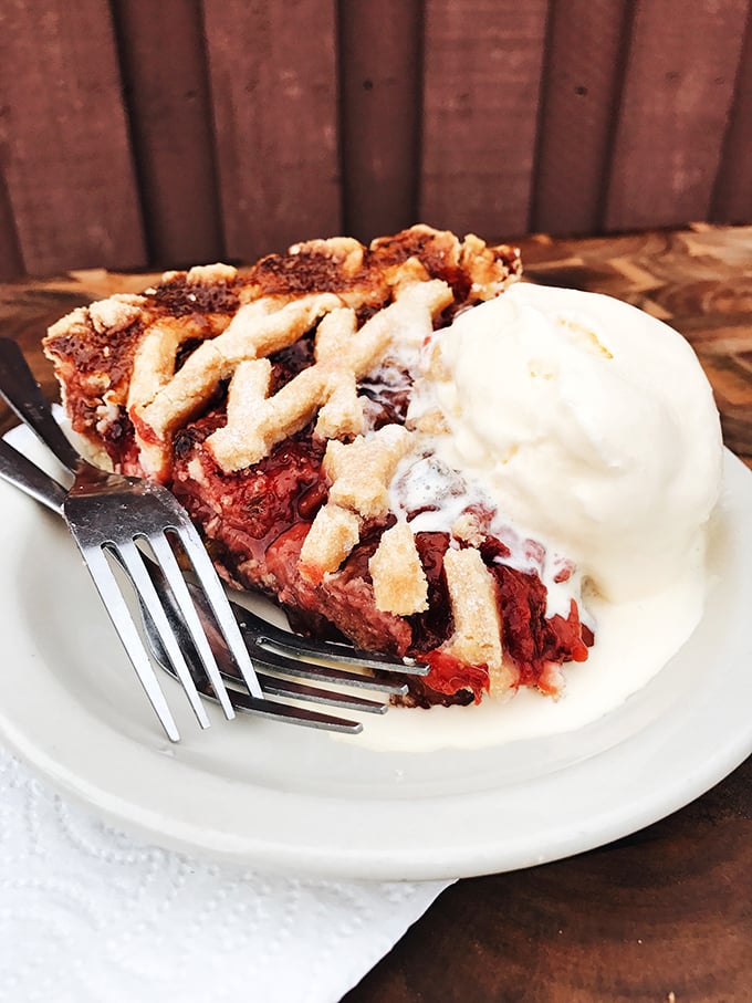 A slice of heaven on a plate! This strawberry rhubarb pie is the perfect marriage of sweet and tart &ndash; like a rom-com for your taste buds.