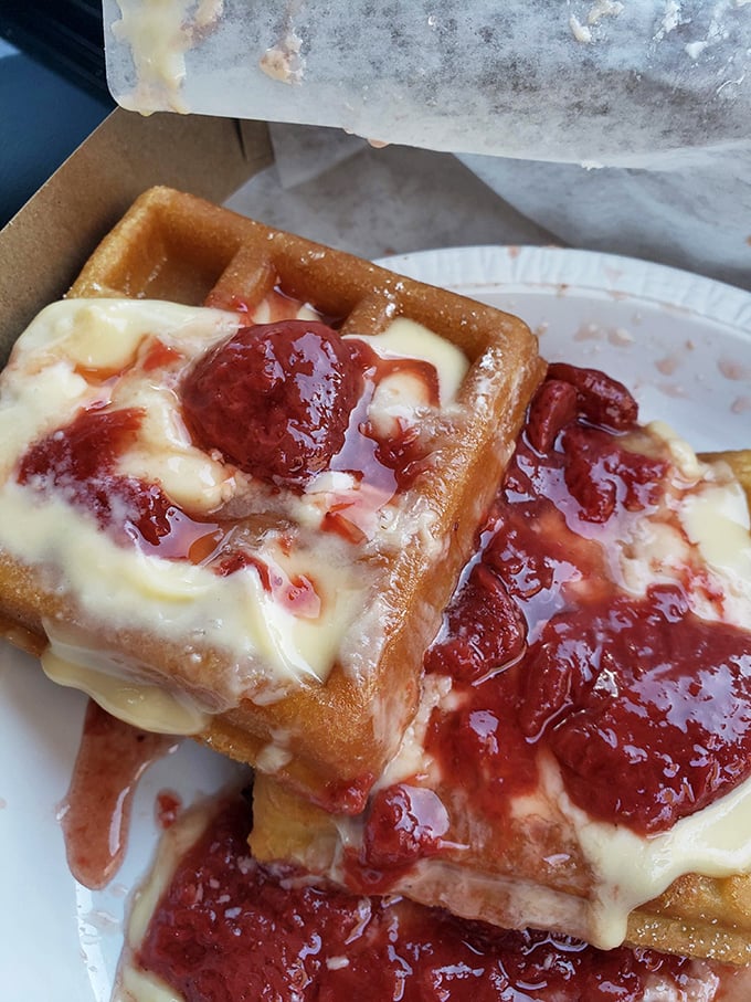Berry bliss on a plate! These waffles are so loaded with strawberries and cream, they could make a fruit salad jealous.