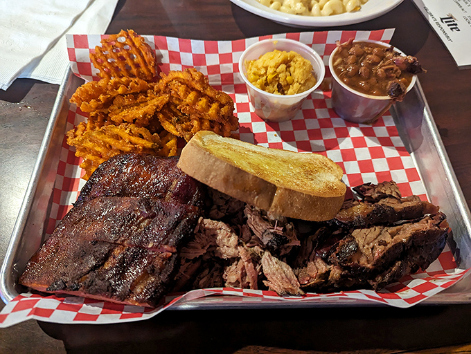 The three-meat platter isn't just a meal&mdash;it's a commitment to excellence that rewards your taste buds with a symphony of smoke and spice.