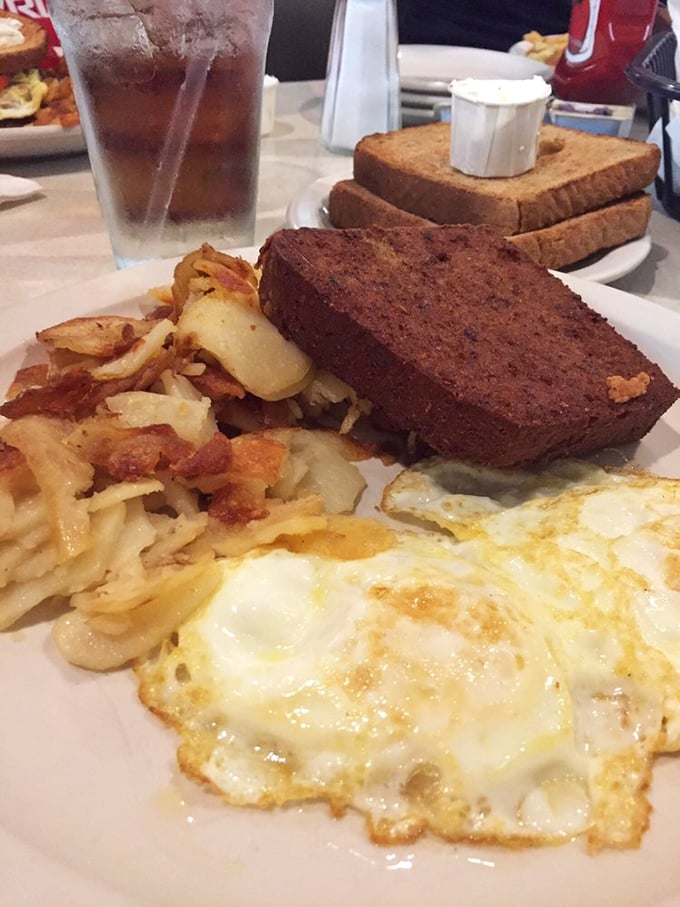 The breakfast trinity&mdash;perfectly cooked eggs, crispy home fries, and scrapple&mdash;a Pennsylvania morning ritual that makes getting out of bed worthwhile.