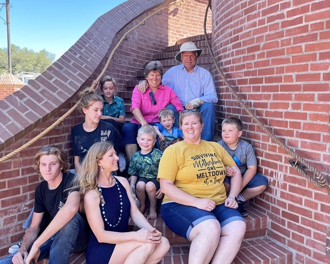 Family reunion or castle invasion? Either way, these folks look ready to storm the keep &ndash; or at least enjoy a picnic on its steps.