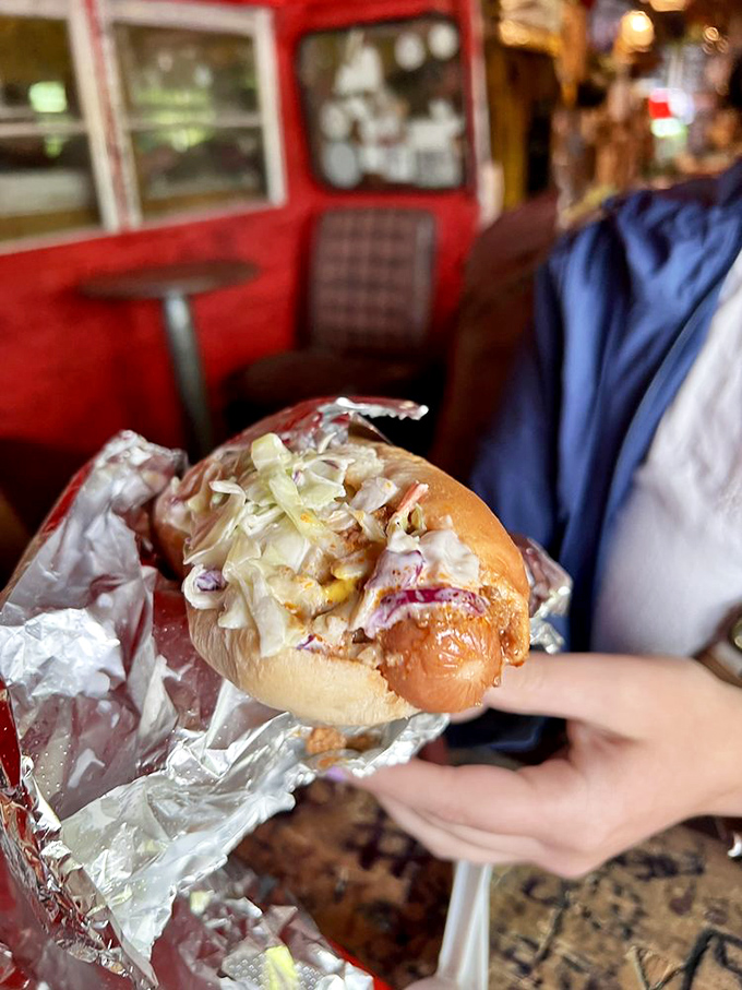 The West Virginia Dog: Where coleslaw meets chili in a bun-derful union. It's like a hoedown in your mouth!