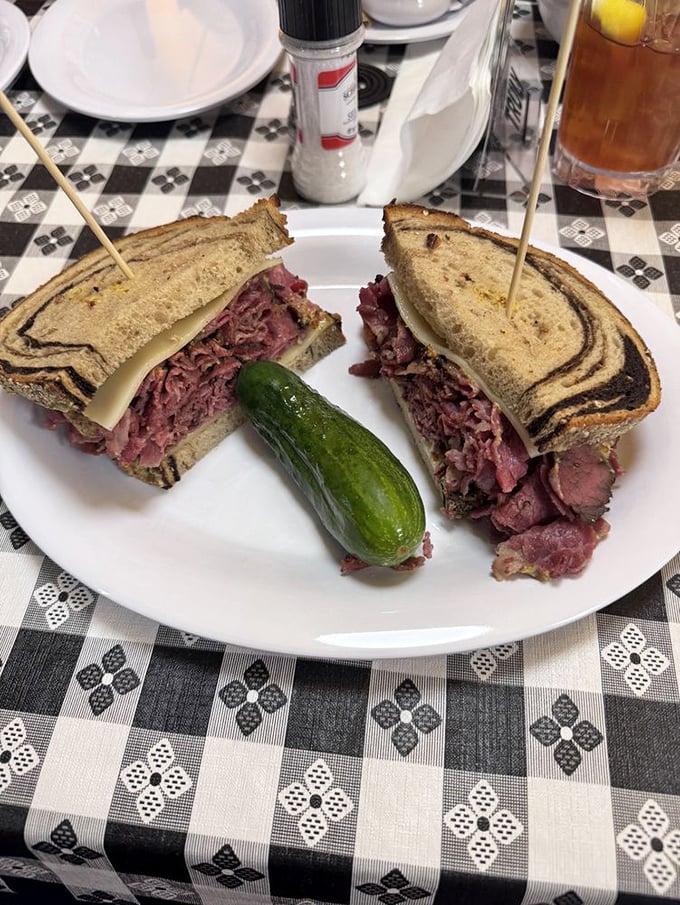 This sandwich isn't just stacked, it's practically the Leaning Tower of Pastrami. Pisa's got nothing on this beauty!