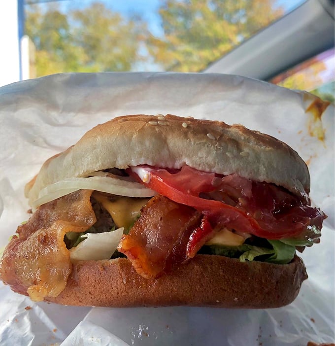 Bacon, cheese, and beef, oh my! This burger is the holy trinity of comfort food, wrapped in a golden bun.