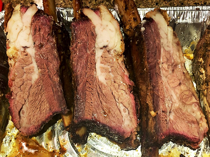 Behold the beefy behemoths! These mammoth ribs look like they could've come from the Flintstones' pet dinosaur. Juicy, smoky, and absolutely irresistible.