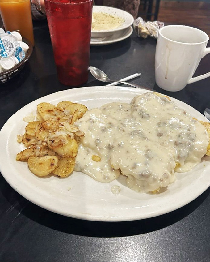 Biscuits so good, they'll make you forget your name! Paired with home fries and a generous helping of gravy, this plate is the breakfast of champions.