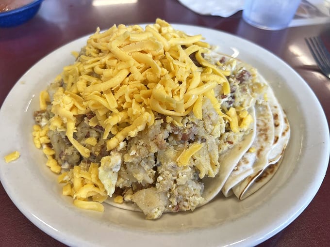 Tacos for breakfast? It's like Christmas morning, but better. These beauties are packed tighter than your grandma's suitcase for a weekend getaway.