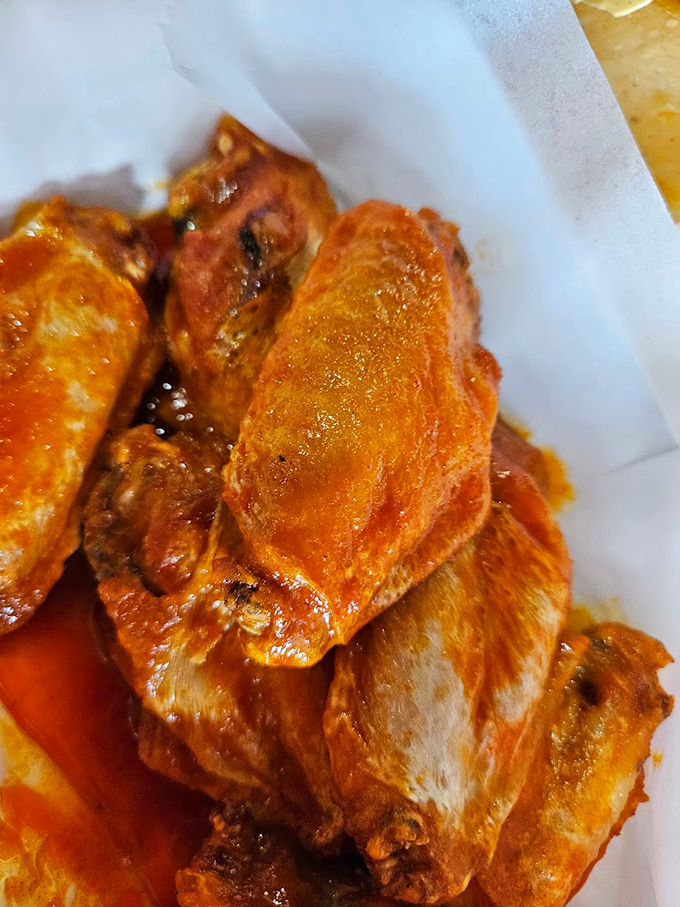 Close-up magic: These wings aren't just cooked&mdash;they're transformed. The caramelized edges and sauce-soaked skin are what food dreams are made of.