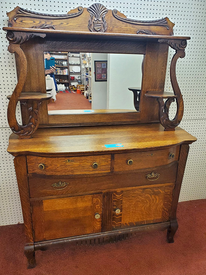 Mirror, mirror on the wall, who's the most vintage of them all? This ornate dresser whispers tales of bygone boudoirs and timeless elegance.