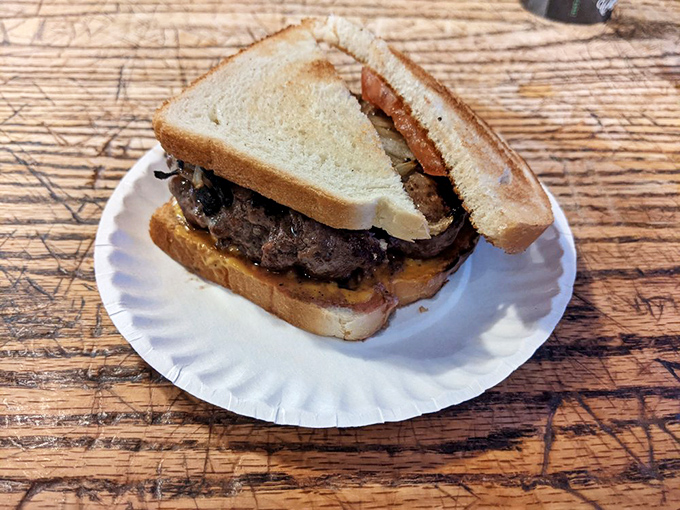 Cheese lovers, rejoice! This isn't just a cheeseburger; it's a work of art that would make Michelangelo weep with joy.