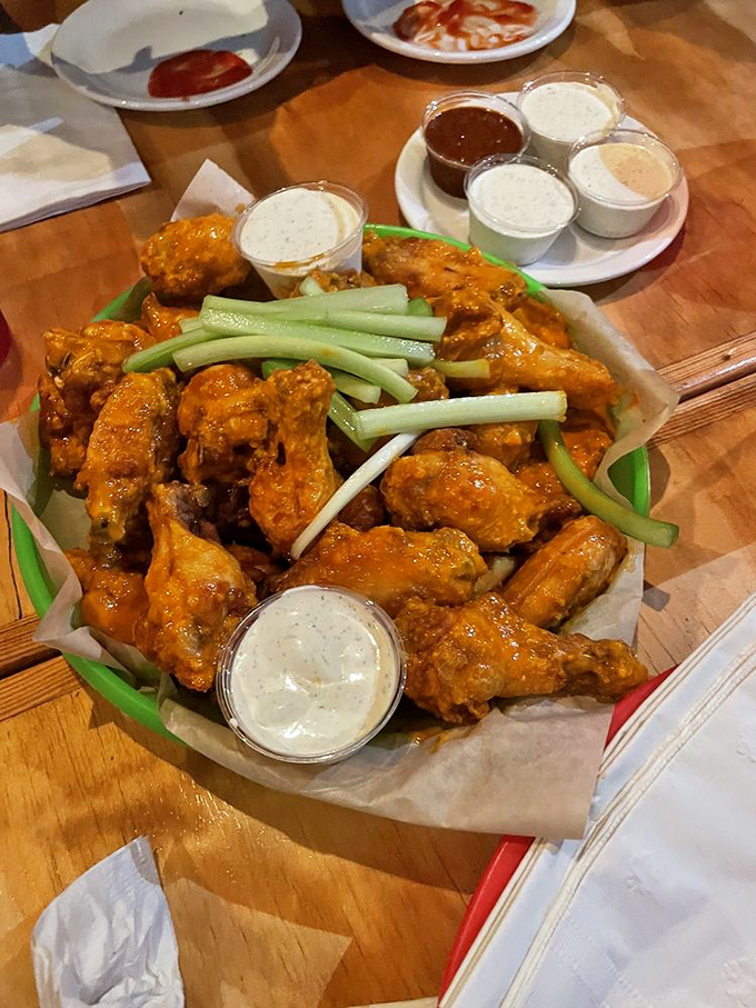 A mountain of wings and a forest of celery. It's like a delicious landscape painting you can eat!