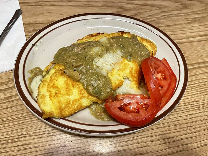 Holy guacamole! This chile verde omelet is like a fiesta in your mouth, with a kick that'll wake you up faster than your morning coffee.