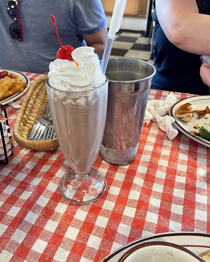 Chocolate shake or drinkable nostalgia? Either way, it's topped with enough whipped cream to make your cardiologist sweat.