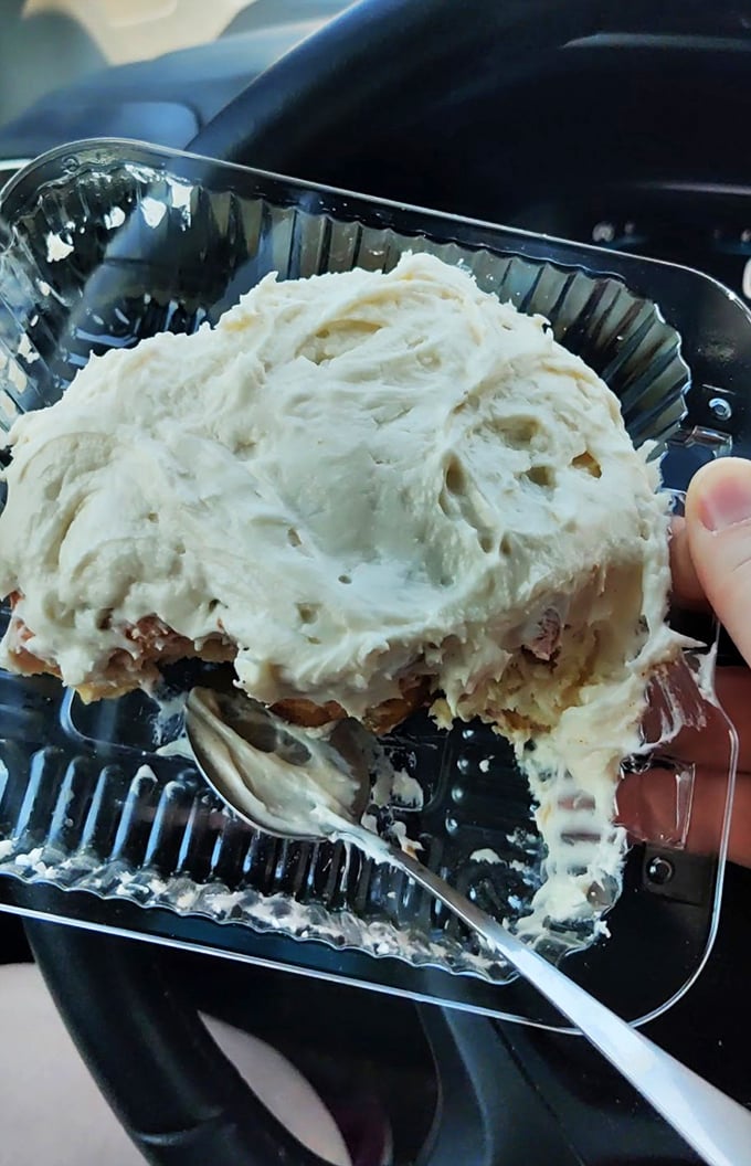 Warning: This cinnamon roll may cause spontaneous happy dances. Creamy frosting meets gooey cinnamon filling in a match made in pastry paradise.