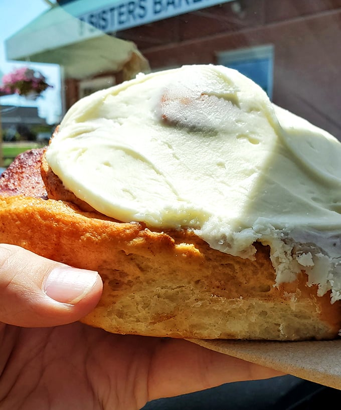 Warning: This cinnamon roll may cause involuntary drooling. With a golden exterior and gooey center, it's a warm hug for your taste buds.