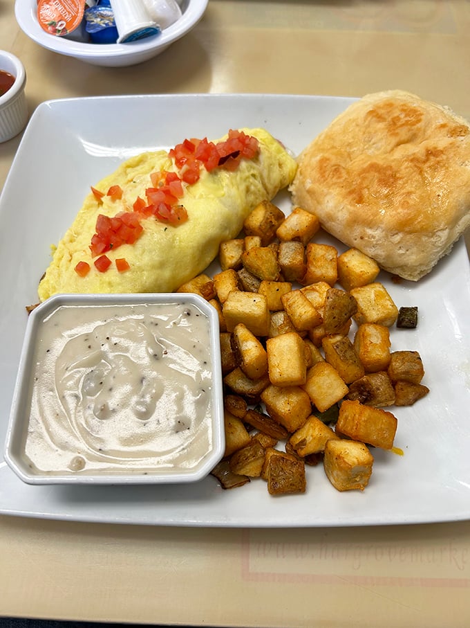 Behold, the omelet of champions! Golden, fluffy, and bursting with fillings - it's a breakfast touchdown in every bite.
