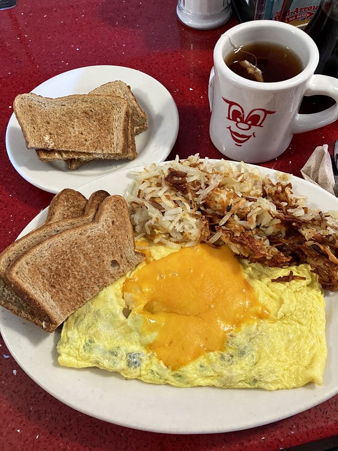 Breakfast of champions! This omelet and hash browns combo is like a warm hug for your taste buds. Bonus: It comes with a side of nostalgia.