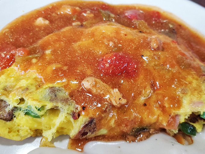 Beware: This omelet may cause spontaneous happiness. Side effects include food coma and an irresistible urge to nap.