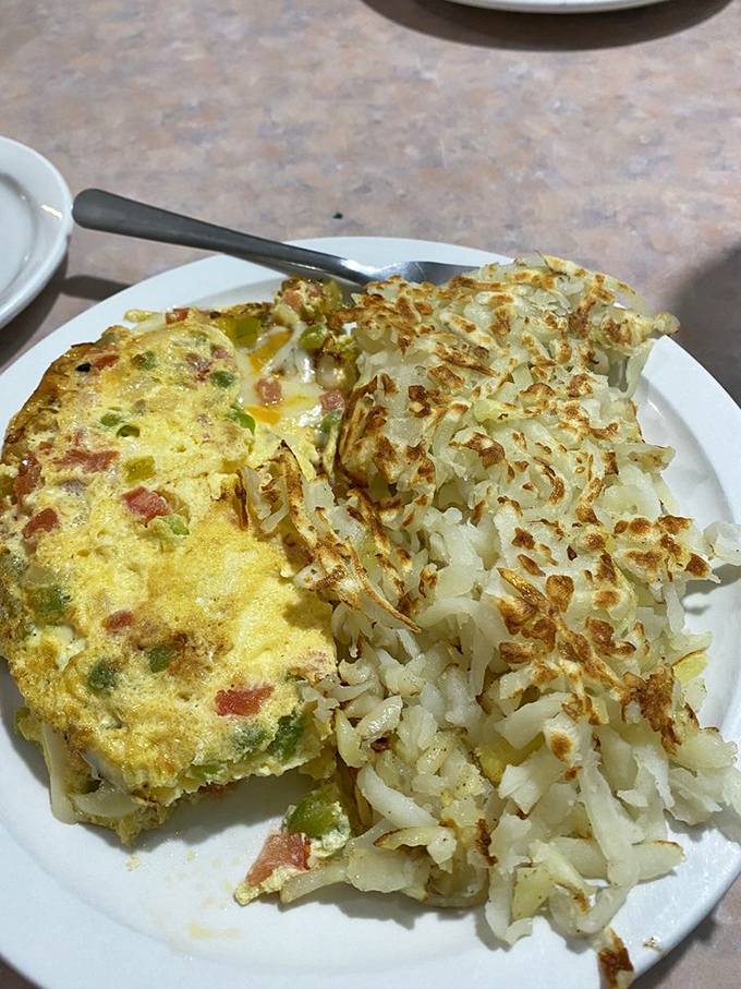This omelet and hash browns combo is the Batman and Robin of breakfast&mdash;a dynamic duo that always saves the day.