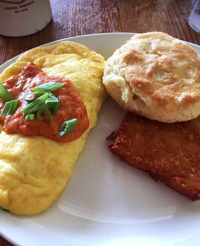 Omelette you in on a secret: this plate is egg-actly what your taste buds have been craving. Biscuit perfection included!