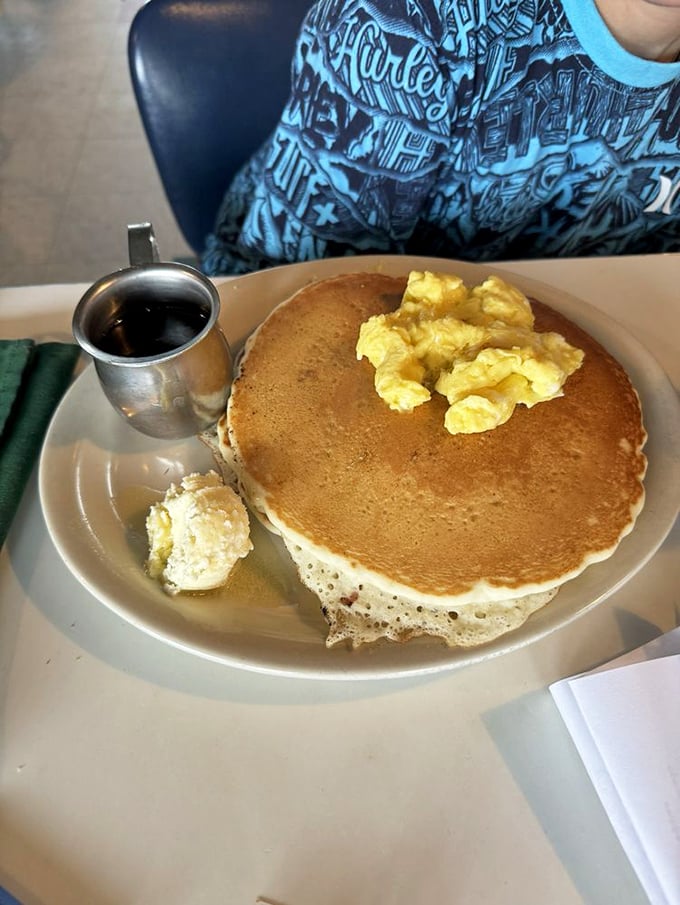 Pancakes so golden, they'd make King Midas jealous. Topped with a pat of butter that's basically saying, "Let's dance!"