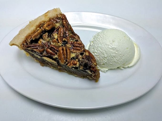 Holy pecan, Batman! This slice of heaven is the superhero of pies, swooping in to save you from boring desserts with its gooey filling and perfectly toasted nuts.