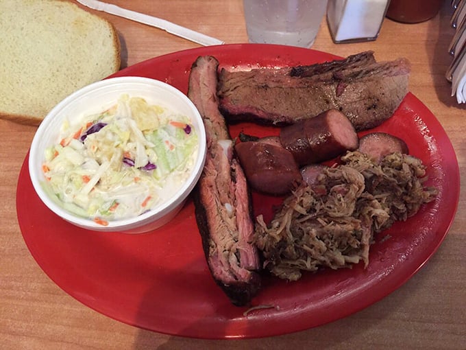 The people have spoken! Smoky brisket, juicy sausage, and fall-apart pulled pork with creamy slaw &ndash; democracy never tasted so good.