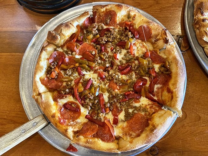 Ladies and gentlemen, we have a winner! This pizza looks so good, it might just make you forget about that diet you were planning to start.