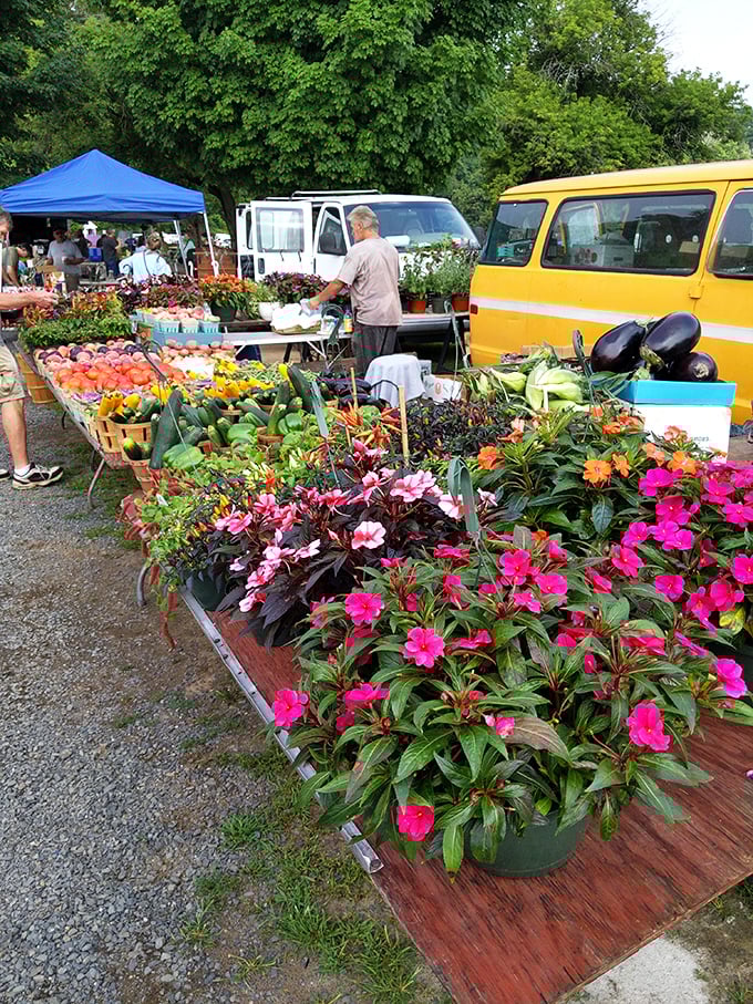 Nature's bounty on display! From vibrant flowers to farm-fresh veggies, this vendor's spread is a feast for the eyes and a treat for the taste buds.