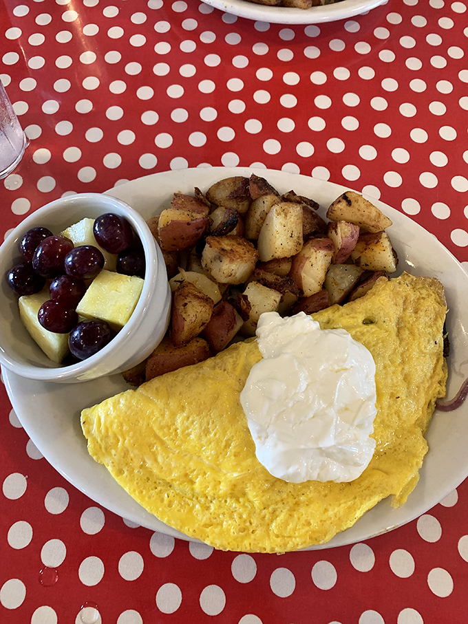 Popeye would be proud! This spinach-packed omelet is a green dream come true, proving that sometimes the tastiest adventures come on a polka-dot tablecloth.