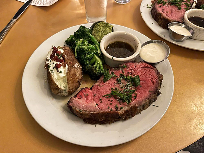 A plate that screams "treat yo' self!" Prime rib, loaded baked potato, and broccoli &ndash; because balance is key, right?