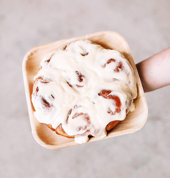 Behold, the cinnamon roll of your dreams! It's not just big; it's Texas-sized with a Midwest heart. Fork optional, napkins mandatory.