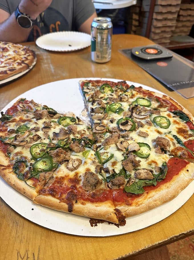 Who knew veggies could party this hard? This pizza's got more green than a St. Patrick's Day parade.