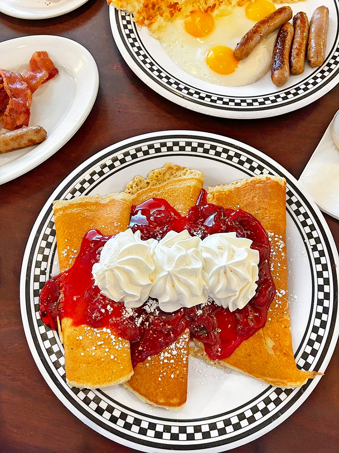 Dessert for breakfast? Yes, please! These strawberry crepes are like a French kiss for your taste buds. Topped with enough whipped cream to make a cloud jealous.
