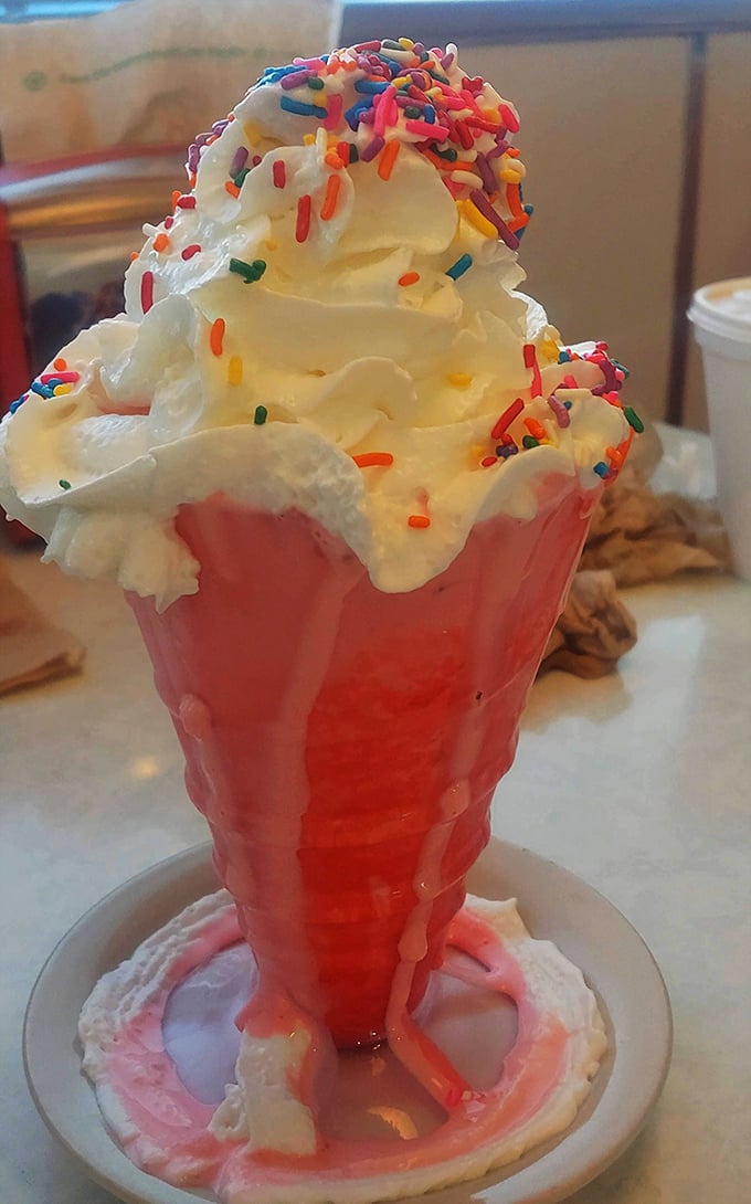 "Pretty in pink, delicious in every bite!" This strawberry shake is so vibrant, it could star in its own 80s teen movie. John Hughes would approve.