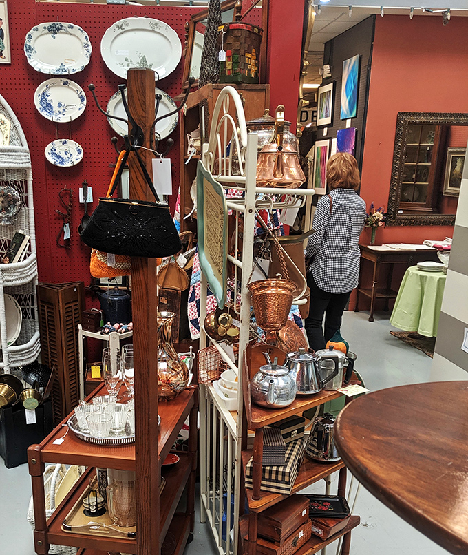 Shoppers in their natural habitat, hunting for that elusive vintage find. It's like "Where's Waldo?" but with more tchotchkes.
