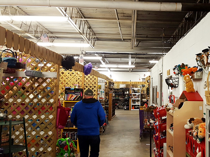 Treasure hunting in action! This shopper navigates the aisles like Indiana Jones in a temple of vintage goodies.