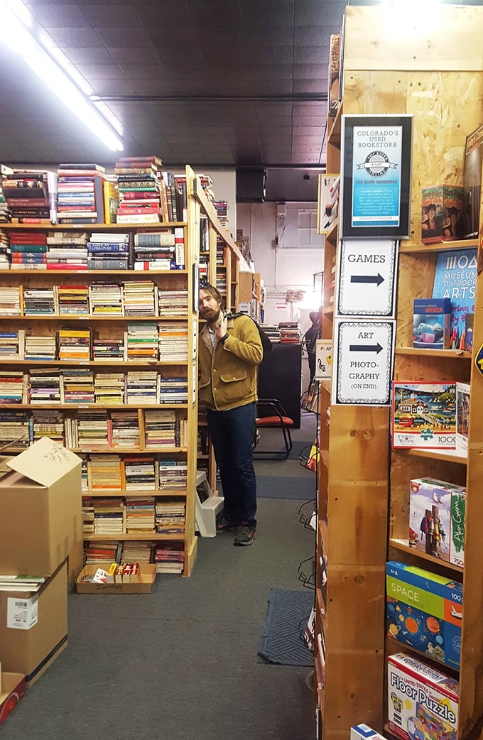 Caught in the act of book browsing! This literary detective is hot on the trail of their next great read.