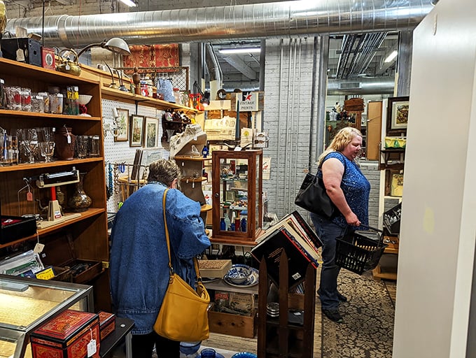 Treasure hunters in their natural habitat. Watch as they navigate the aisles, eyes gleaming with the thrill of the find. Who knows what gems they'll unearth?